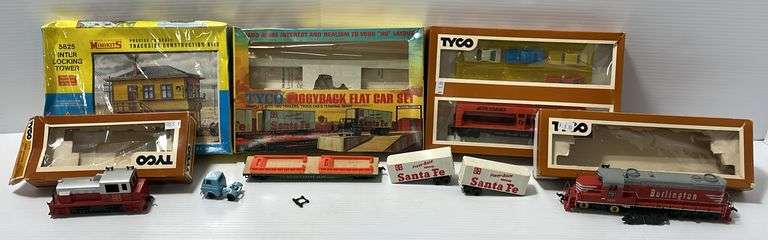 Older train accessories and (2) engines, include: Tyco diesel switcher ...