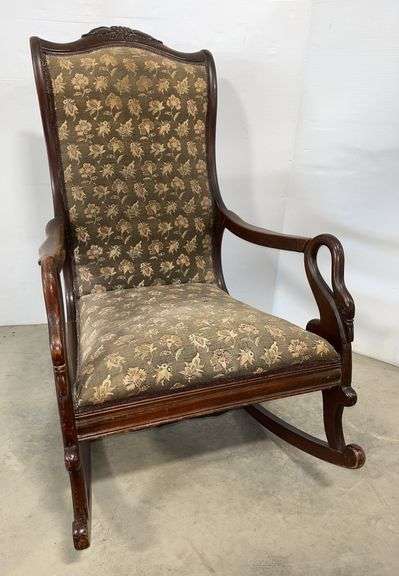 Antique rocker with carved swan heads and carved back, seller states ...