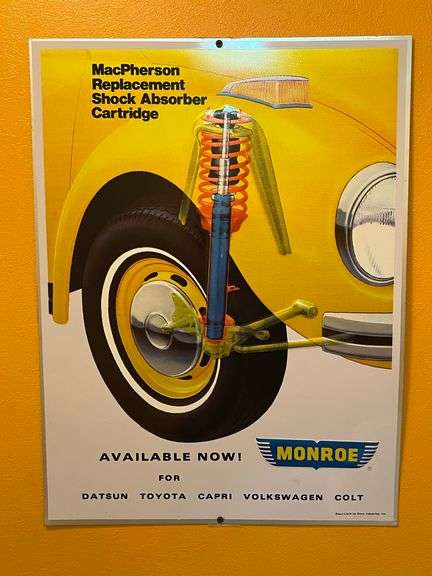 Metal Monroe Shocks Sign by Stout Industries - Albrecht Auction Service