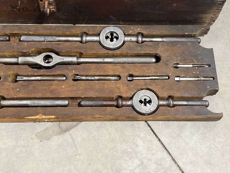 Two-level antique tap and die set in wooden box, 26"W x 9"D x 4"H, good ...