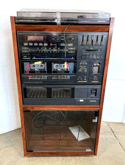 Entertainment stack on wheels, turntable, sound design receiver, AM/FM ...
