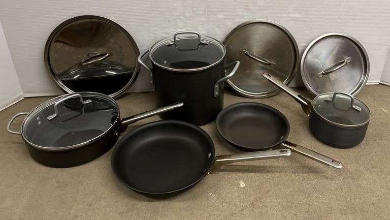 Assorted pots and pans with lids, lids and pots don't go together, up ...
