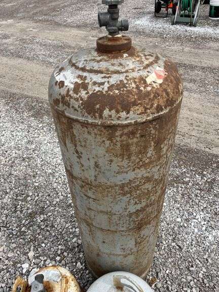 (4) Little propane tanks, 20 lbs each; (1) Big propane tank, 100 lb ...