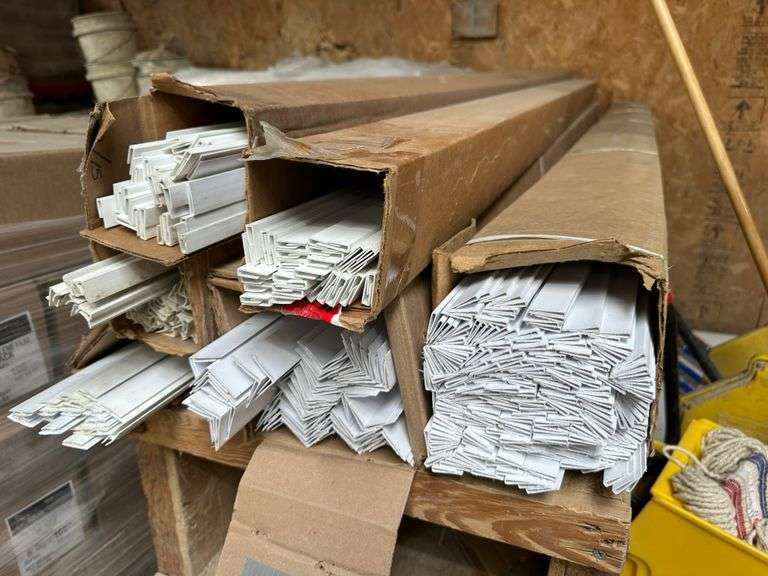 Assortment of Vinyl Divider, Wall End Cap and Corner (partial boxes but ...