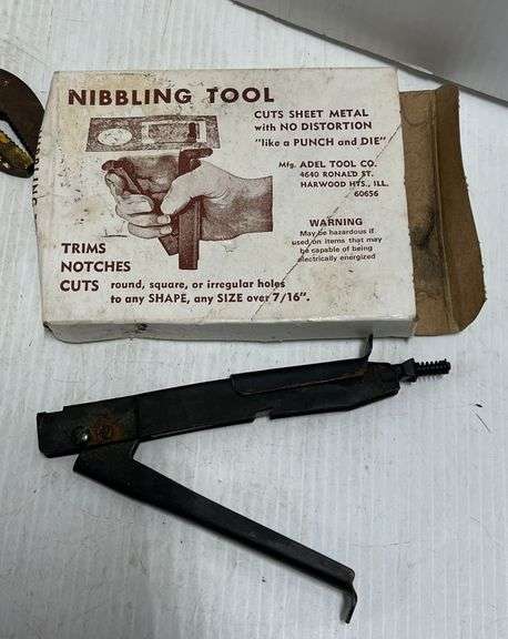 Assorted tools, include: Wire clippers, pliers, wrenches, small pipe ...