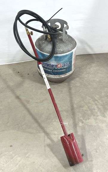 Flamethrower or weed burner with propane tank, used to burn ditch banks ...