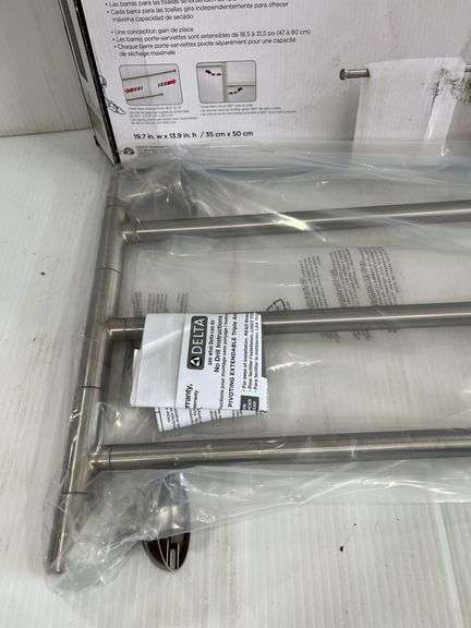 Delta pivoting extendable three-arm towel rack, new - Albrecht Auction ...