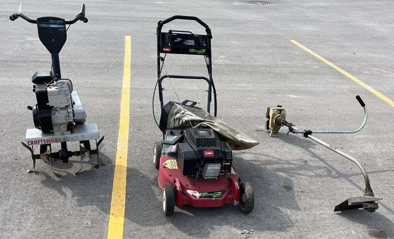 Craftsman 5 HP front tine tiller; Toro Super Recycler with bag, self ...