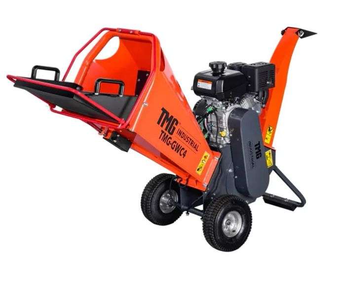 TMG Industrial 4" wood chipper powered by 7 HP Kohler Command Pro Series Engine, 6" reversible ...