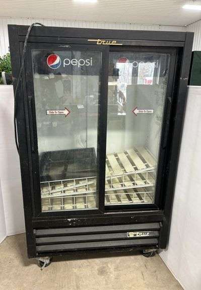 Pepsi Cooler, 36"W x 18"D x 59"H, will need to be cleaned, has wear ...
