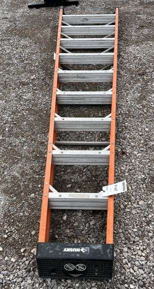 Orange 10' Husky Ladder, used - Albrecht Auction Service