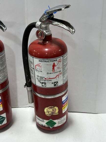 (2) Fire extinguishers, A-B-C, fully charged and in proper working ...