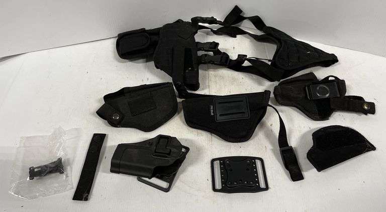 (3) Pistol holders, and (1) Shoulder holder, good - Albrecht Auction ...