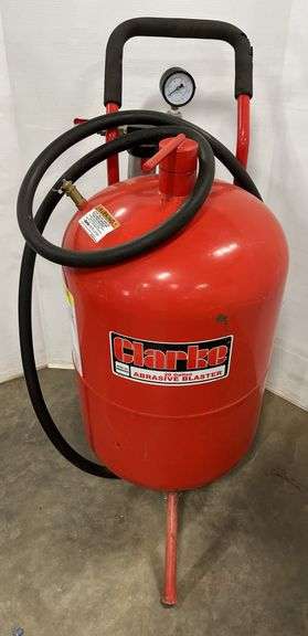 Clarke 20-gallon sandblaster, half full of blasting media, works great ...