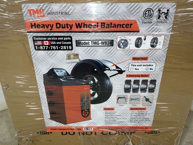 TMG Industrial self-calibrating wheel balancer, 10" to 24" rim ...