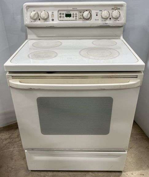 Spectra electric stove, white glass top, everything works, 30"W x 25"D ...