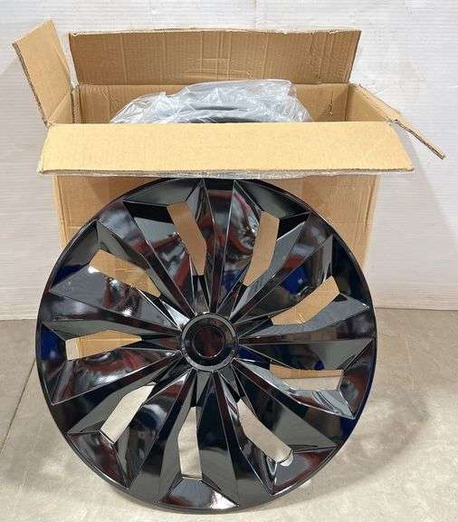 (4) Black hubcaps, 16" - Albrecht Auction Service
