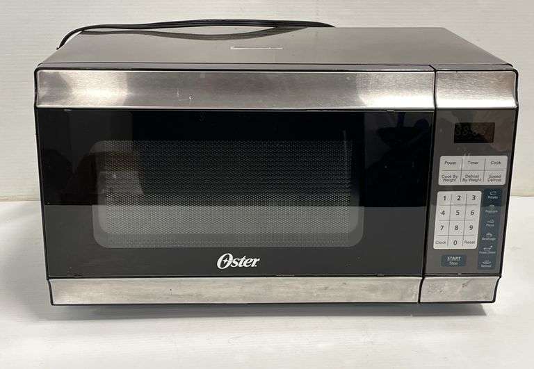 Oster countertop microwave, overall- 17 3/4" x 10 1/2" x 13", 0.7 Cu ...