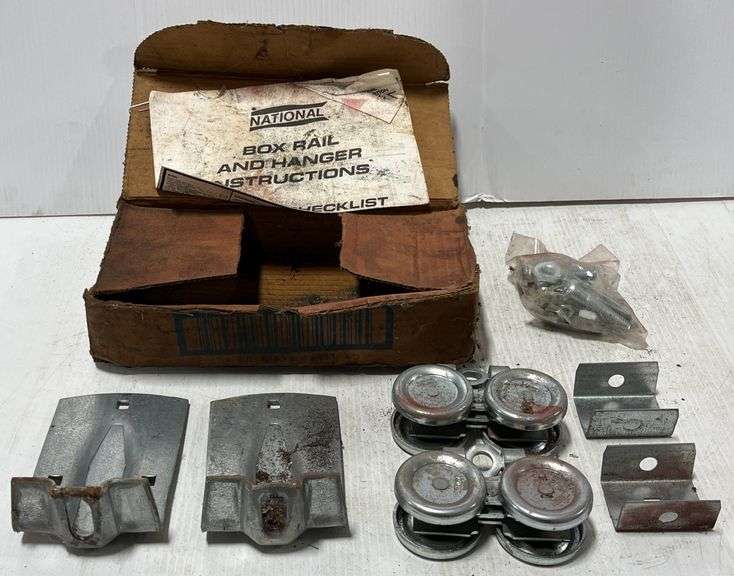 Pair of track rollers for shop door, NIB - Albrecht Auction Service