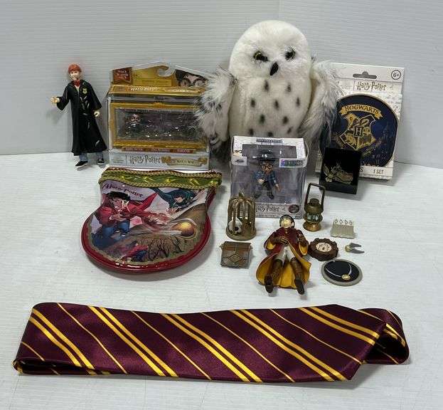 Collection of Harry Potter items, includes: Official tie, stuffed ...
