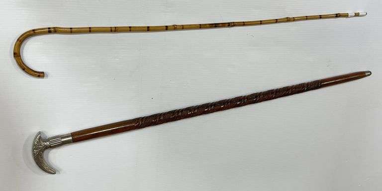 (2) Older canes, includes: 1- Hand carved with a nice metal handle, and ...