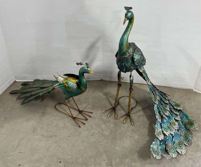 (2) Metal colorful peacocks, 24"W x 27"H and 30"L x 17 3/4"H, both nice ...