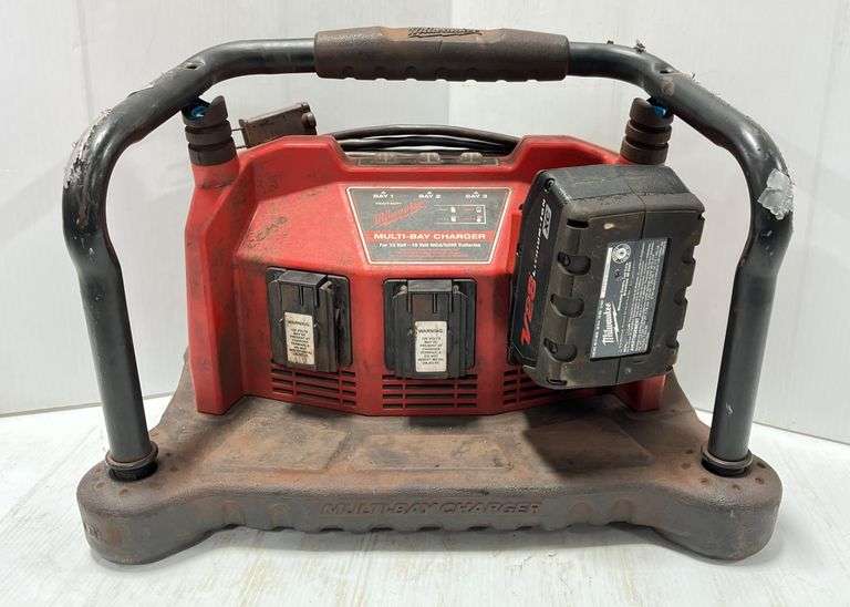 Milwaukee multi-bay charger and battery, 15"W - Albrecht Auction Service