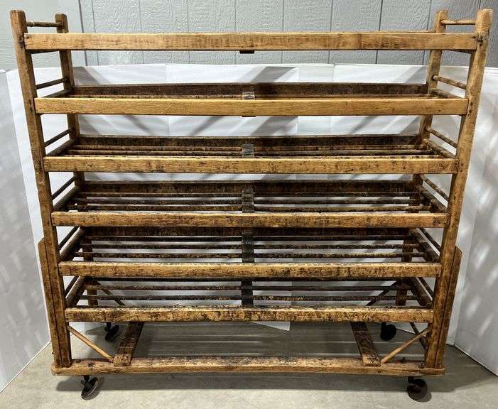 Factory shoe rack, has black marks on it, 57"W x 16"D x 54"H, rolls ...
