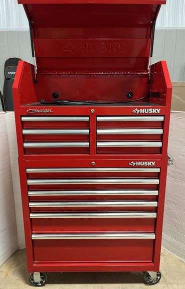 Husky tool boxes, top box with six drawers and power strip, and a ...