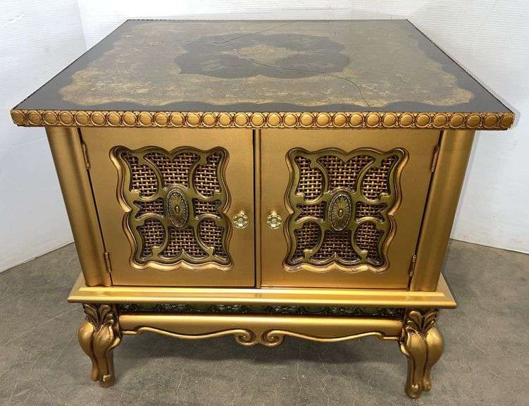 Gold colored cabinet lamp table with gold motif on top, very ornate ...