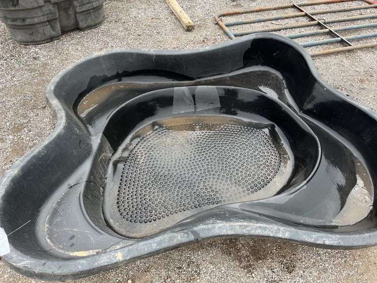 Black plastic pond insert, 67: x 87" x 21", good - Albrecht Auction Service