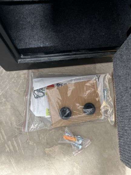 Sentry Safe, combination included in envelope attached to front door ...