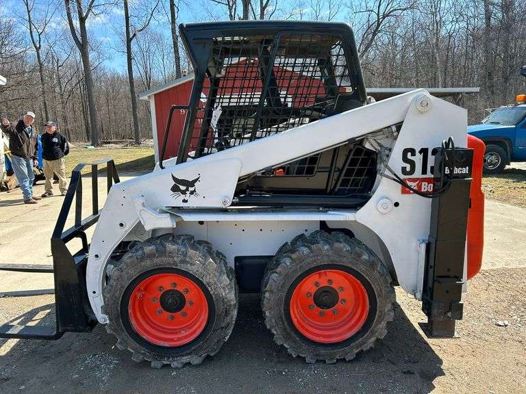 Bobcat Skidsteer S130 with Forks. Rear Stabilizer Arms for Backhoe ...