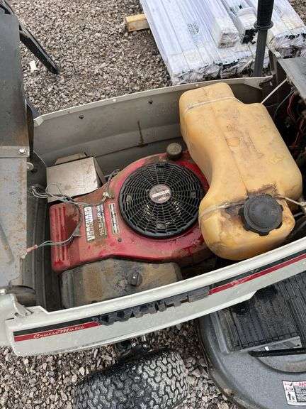 White bagger mower, 15 horse, runs and cuts as it should, starts on ...