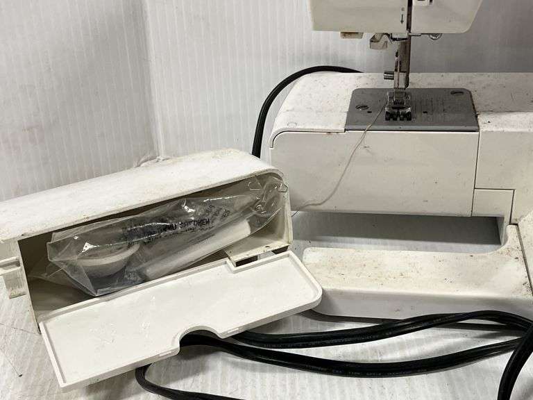 Singer sewing machine, no. 1120, with foot pedal, approx. 14"L, works ...