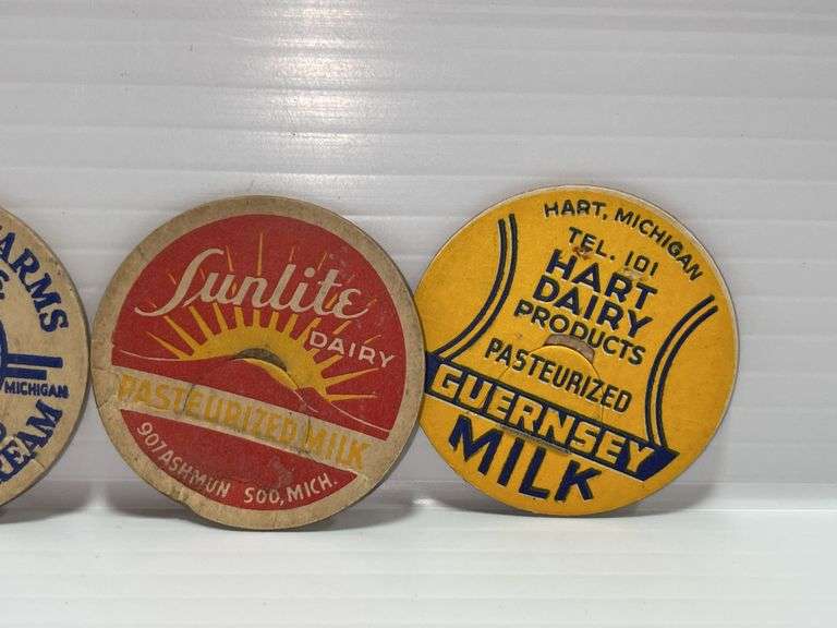 (12) Cardboard milk bottle caps from various Michigan dairies in the ...