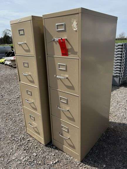(2) Filing cabinets with four drawers each, 15"W x 26 1/2"D x 52"H each ...