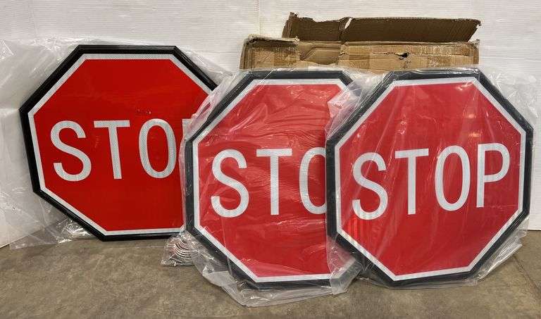 (3) Reflective stop signs with metal backs and pole mounting brackets ...