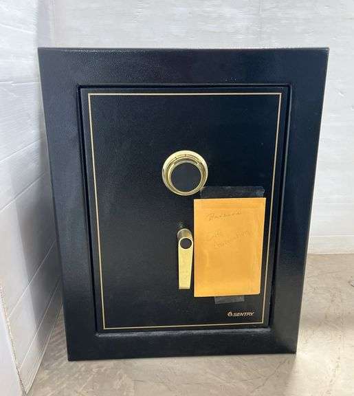 Sentry Safe, combination included in envelope attached to front door ...