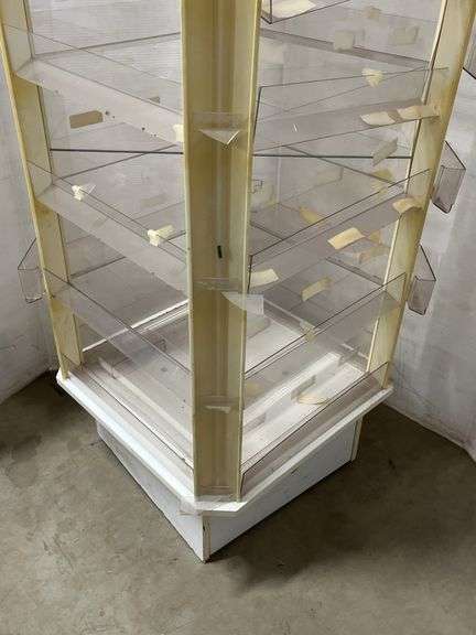 Plastic display rack, 23"W x 23"D x 70"H, fair - Albrecht Auction Service