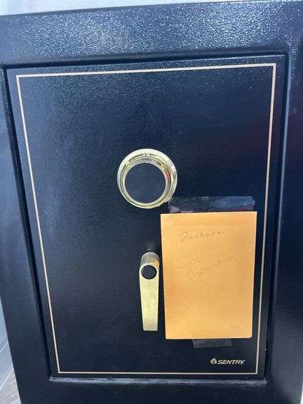 Sentry Safe, combination included in envelope attached to front door ...