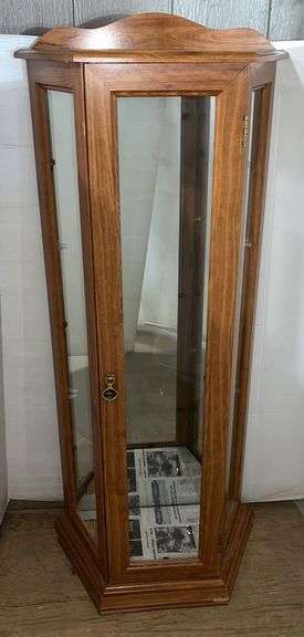 Woodgrain curio cabinet with two glass shelves in bottom, 22"W x 11 1/2 ...