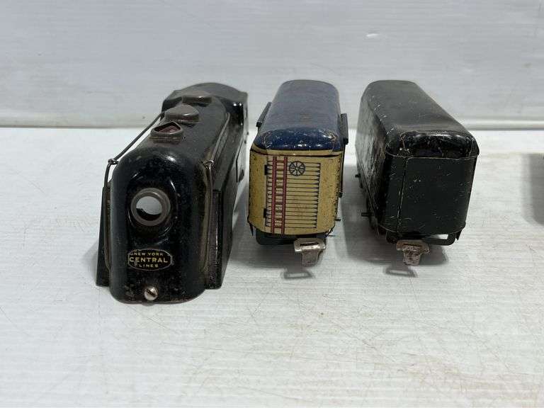 Marx tin train set, includes: Caboose, tanker, hopper, 2- Rock Island ...