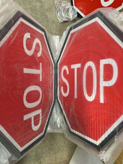 (3) Reflective stop signs with metal backs and pole mounting brackets ...