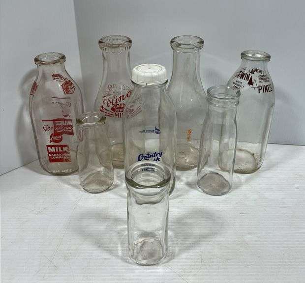 (8) Milk bottles, include: 5- Quarts and 3- Half pints, brands include ...