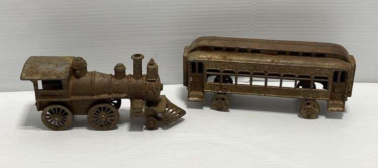 Antique cast iron steam engine and Michigan Central RR no. 98 coach car ...