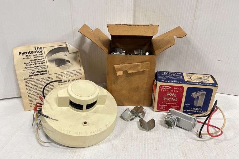 Fire Pyrotector, NOS; Nite switch, dusk-to-dawn, NOS; Box of metal ...