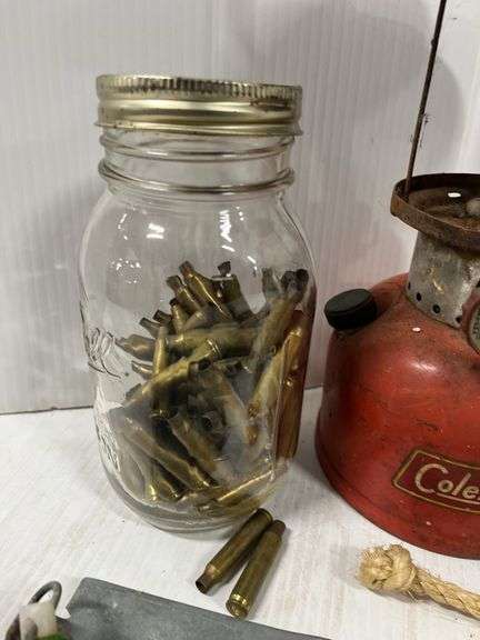 Red Coleman lantern, for parts or repair; Pair of Arctic spurs, strap ...