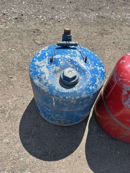 (2) Old school gas cans, 6.5 and 5-gallon; 5-Gallon kerosene can - Albrecht Auction Service