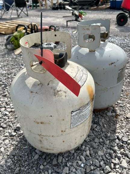 (2) Propane tanks, one is half full, and the other is almost full, new ...